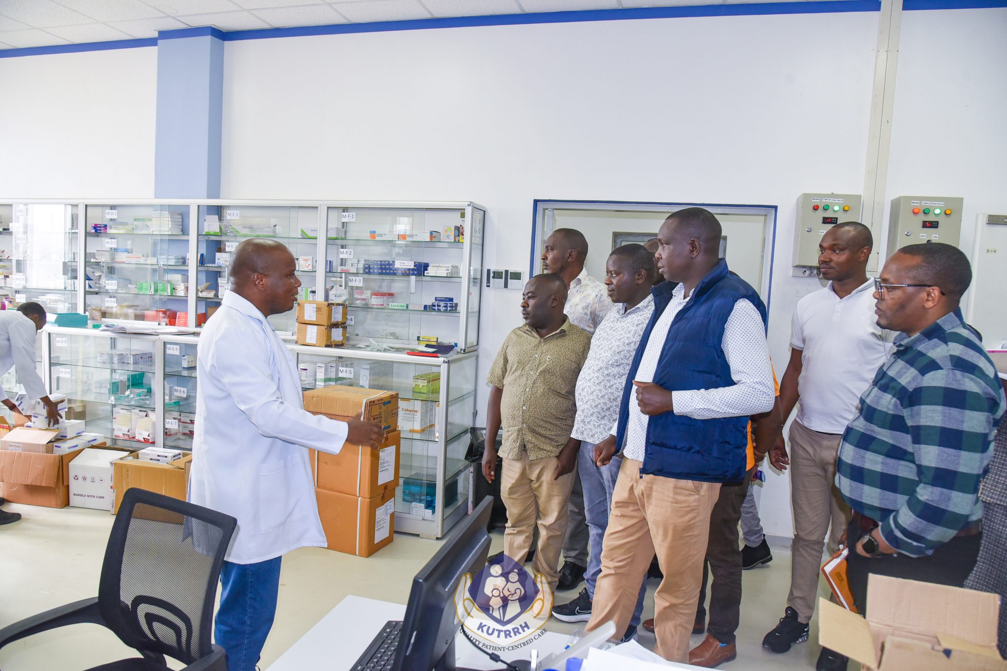 Dr. Eric Mwangi of KUTRRH’s Pharmacy department talks to MCAs from ...